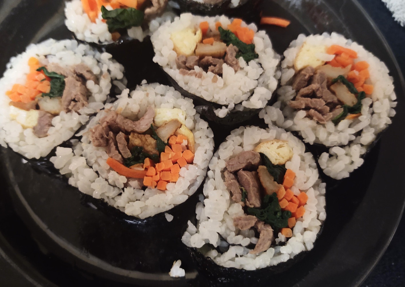 BTS 커뮤니티 포스트 - First attempt at Gimbap.... not too great on the rolling ...