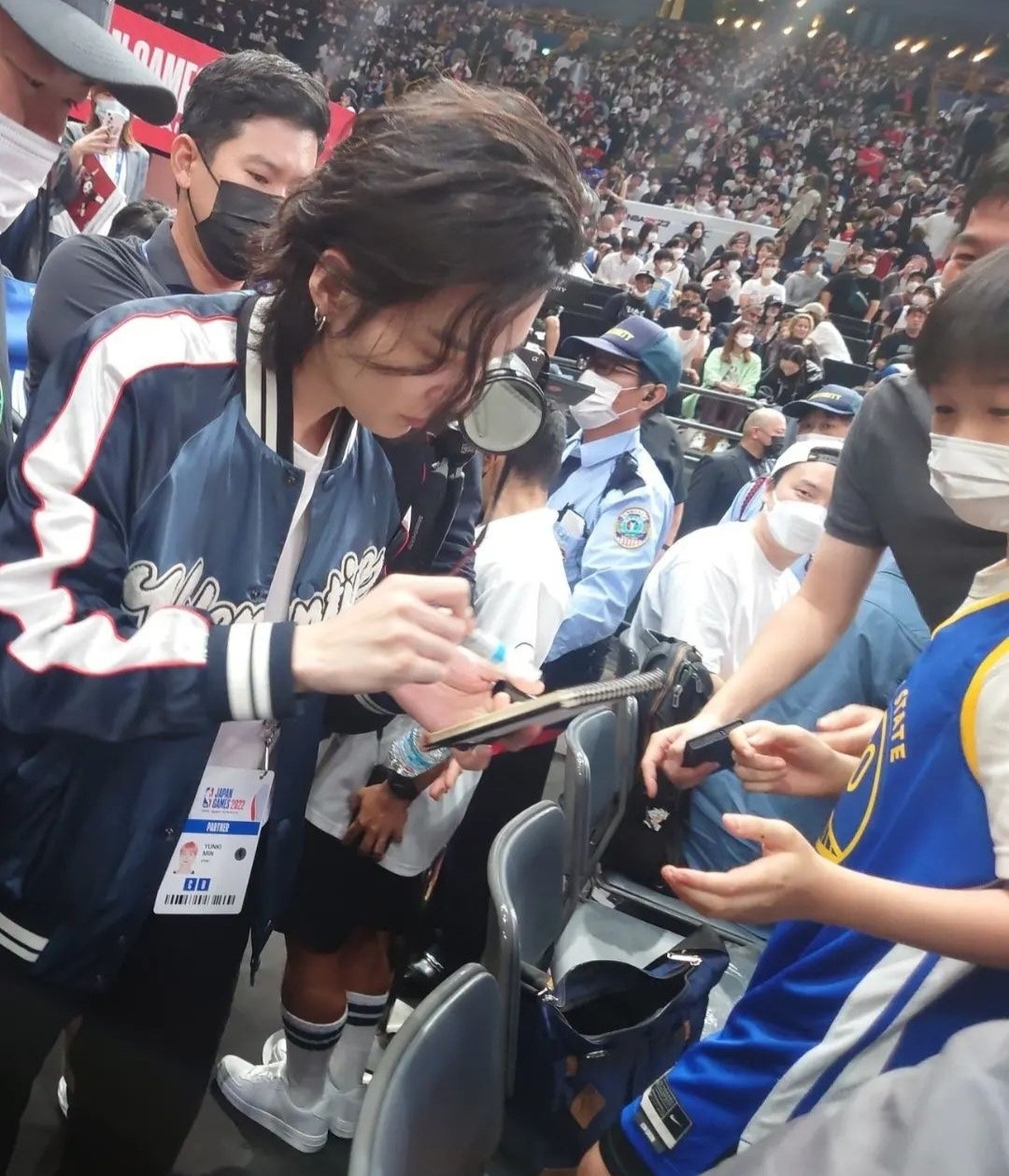 BTS Community Post - Yoongi signing for a little fan. 😊