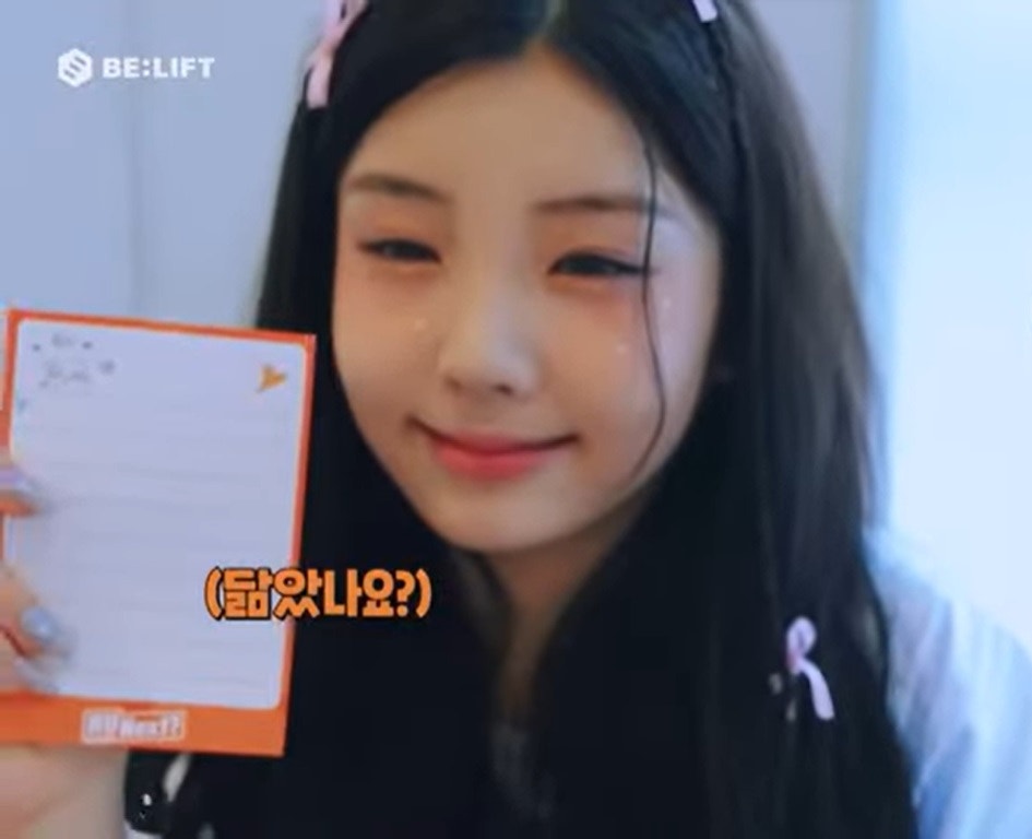 ILLIT Community Post - now behold... the birth of ultimate fake smile # ...